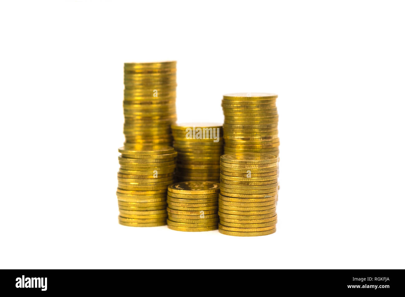 Columns of coins, piles of coins on white background, business and ...