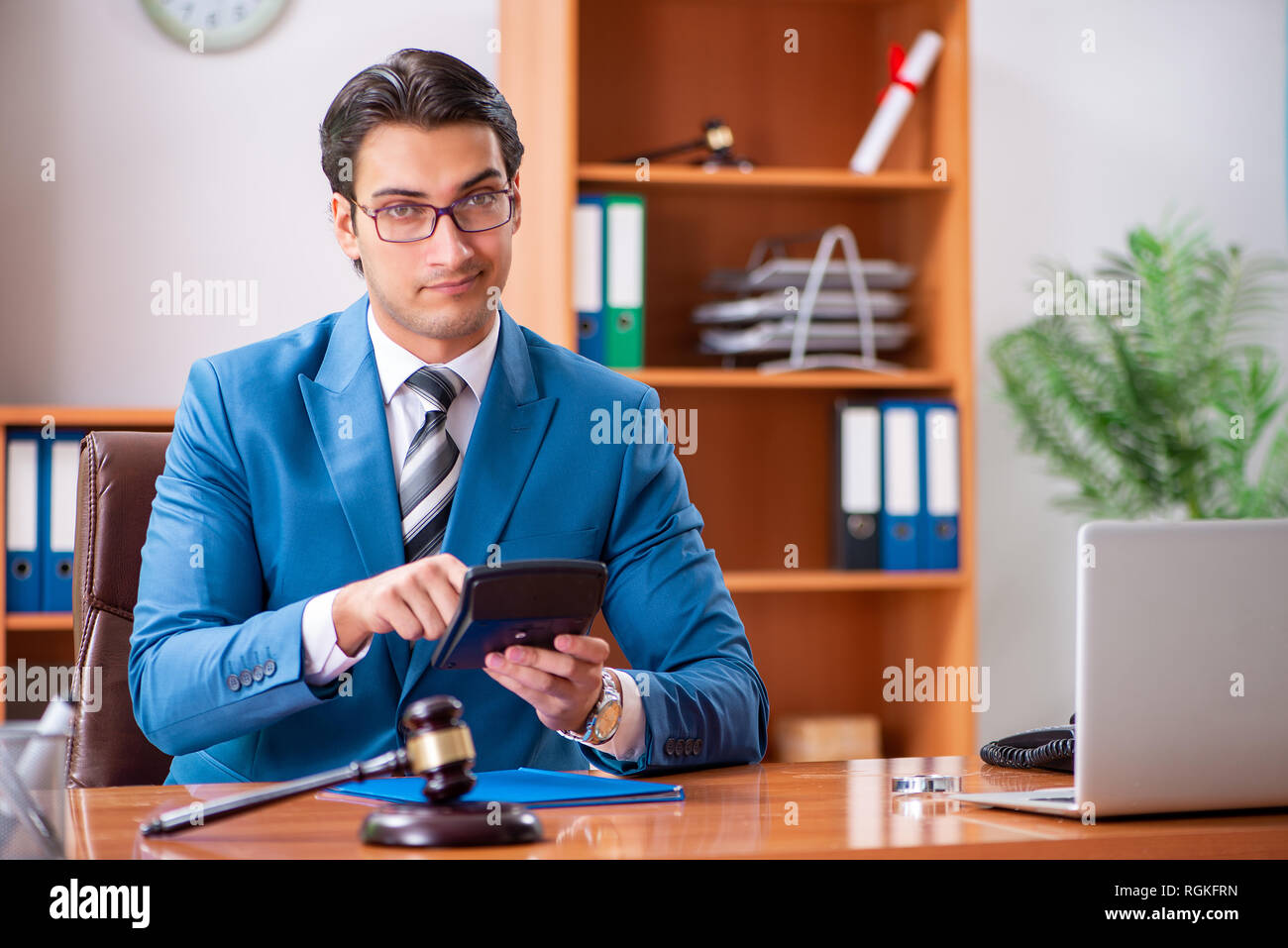 Lawyer working in the office Stock Photo - Alamy