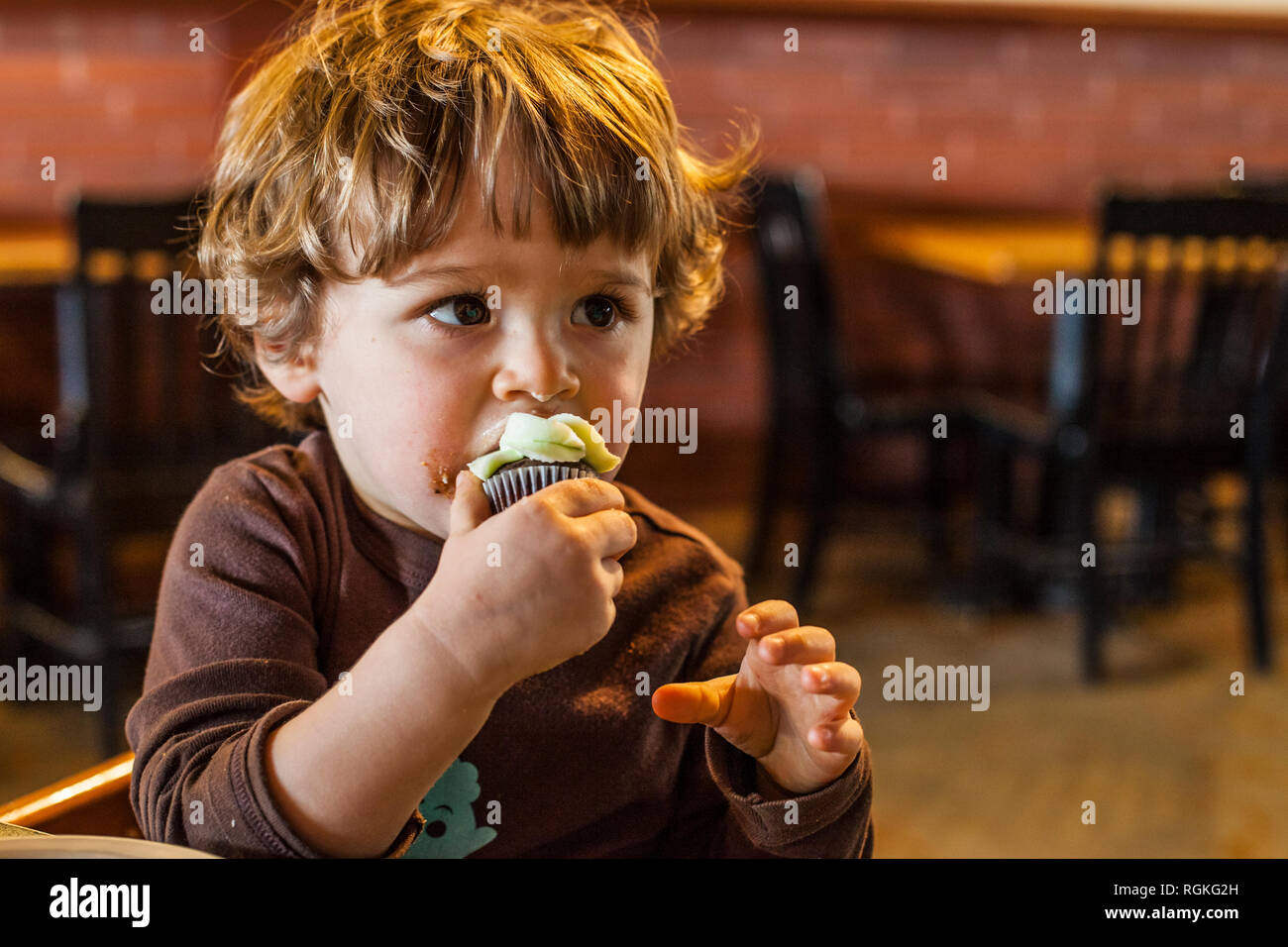 Messy Kid Eating Cake