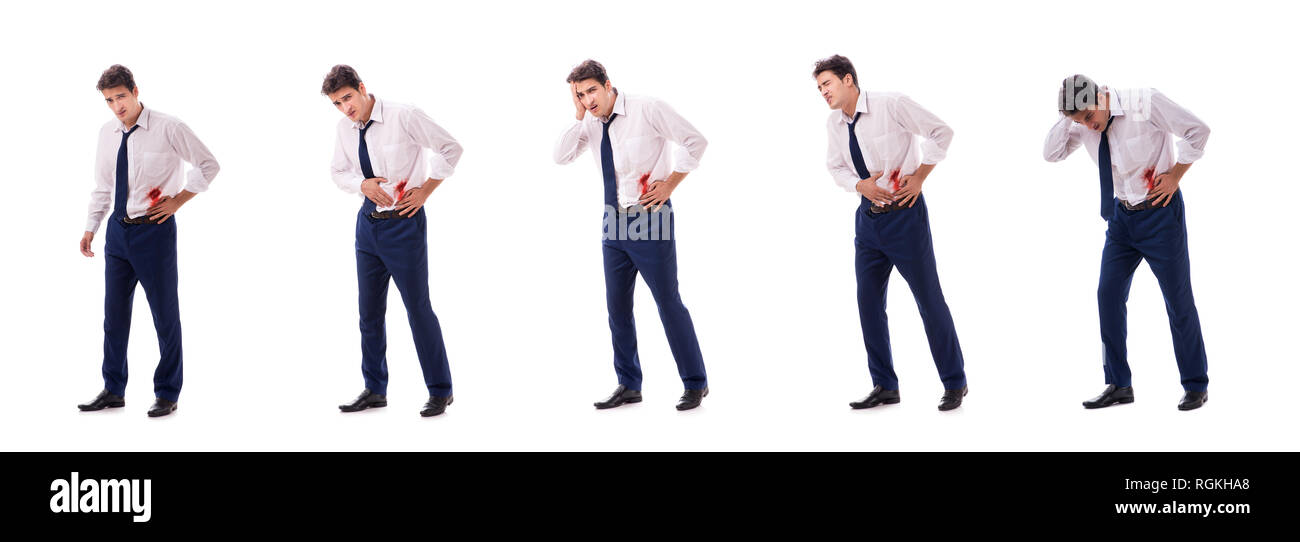 Wounded businessman with blood stains isolated on white background ...