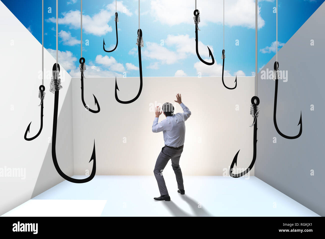 Businessman being tempted to bite the bait Stock Photo - Alamy