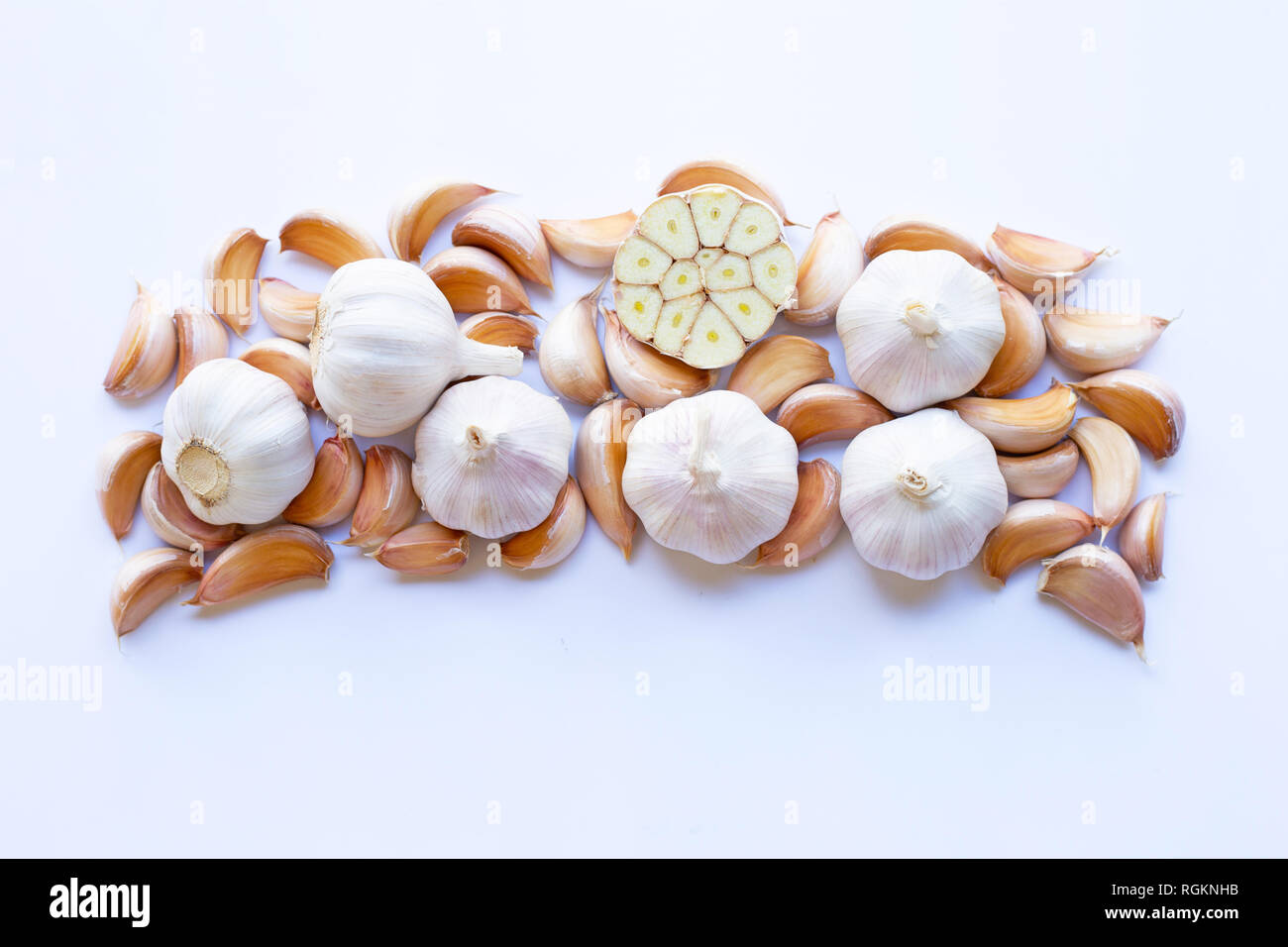 Garlic on white background. Top view Stock Photo - Alamy