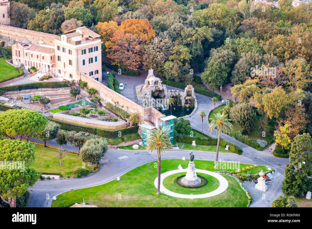 High view on cozy Vatican gardens with sculptures and fountains and ...