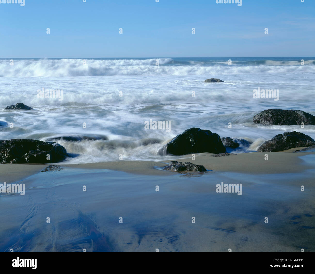 USA, Oregon, Roads End State Park, Layers of rolling waves approach ...