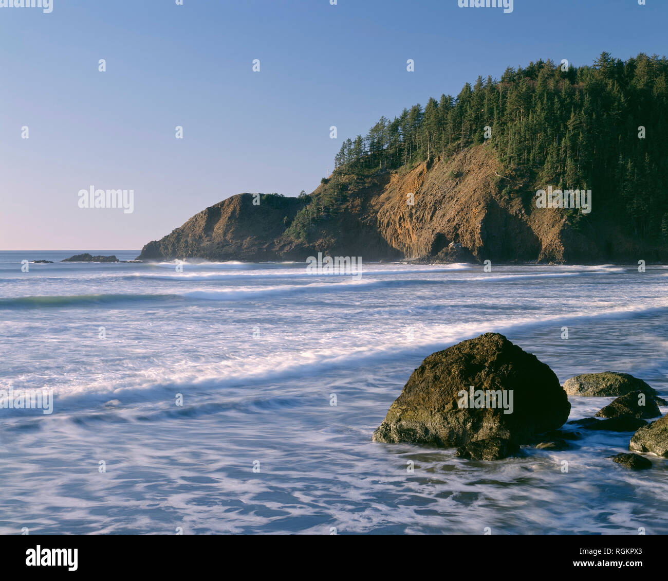 USA, Oregon, Ecola State Park, Indian Point reaches towards incoming ...