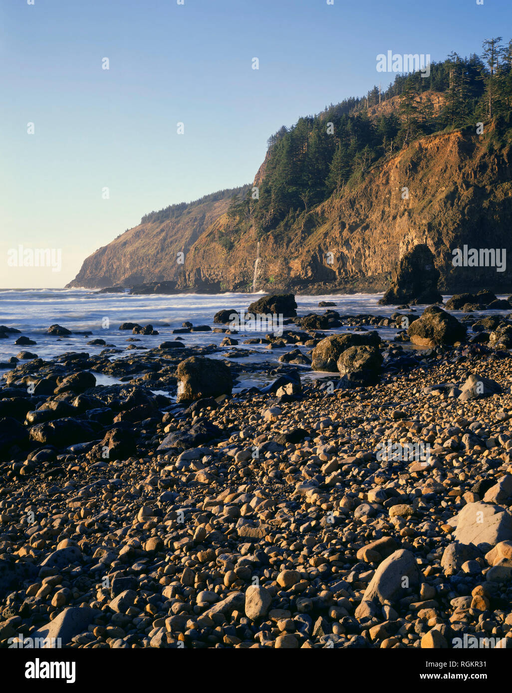 USA, Oregon, Cape Meares State Park, Waterfall plunges off the south ...