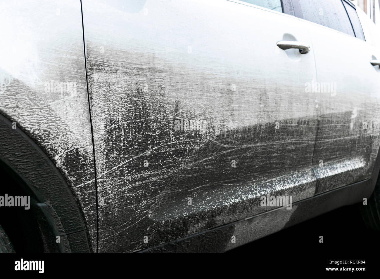 Side view of a very dirty car. Fragment of a dirty SUV. Dirty ...