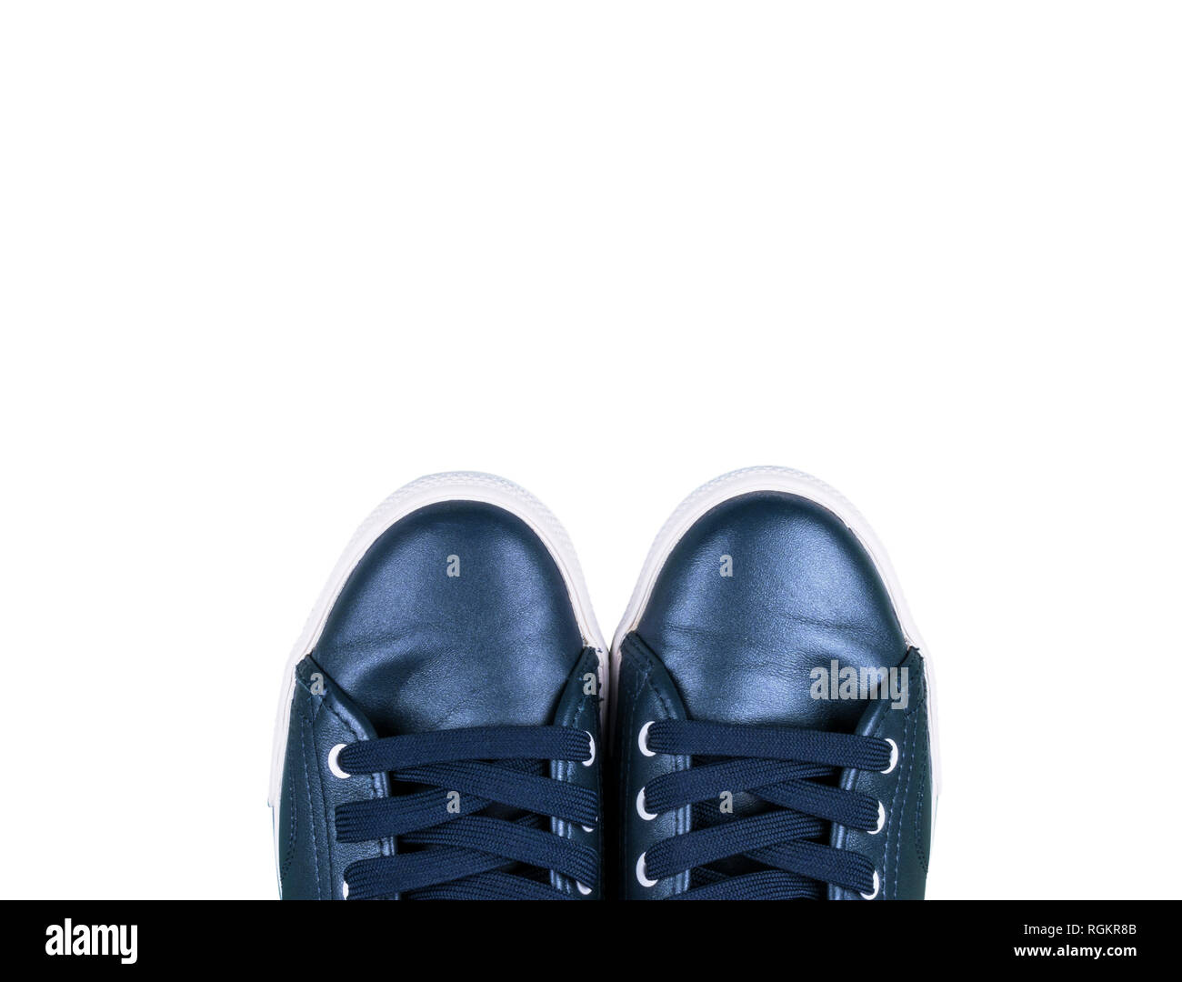 Overhead view of blue sports shoes isolated on white background Empty ...