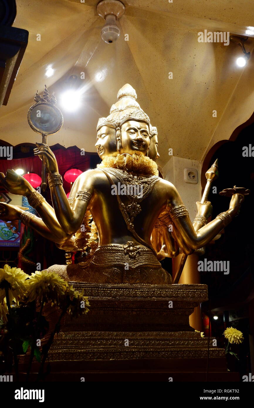 Four face buddha hi-res stock photography and images - Alamy