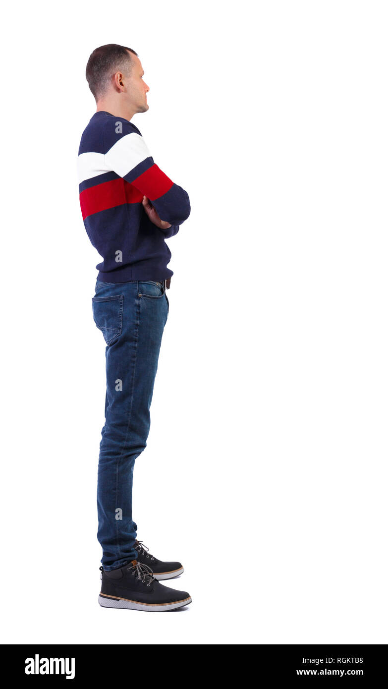 Side view of a stylish man in a sweater. Rear view people collection ...
