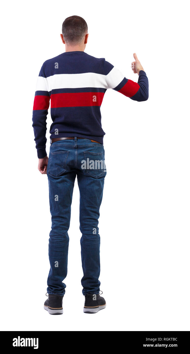 Back view of man in sweater shows thumbs up. Rear view people ...