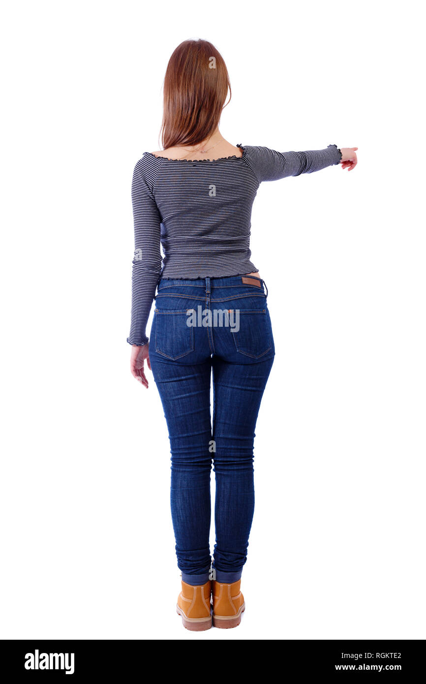 Back view of a woman points his hand upwards. Rear view people ...