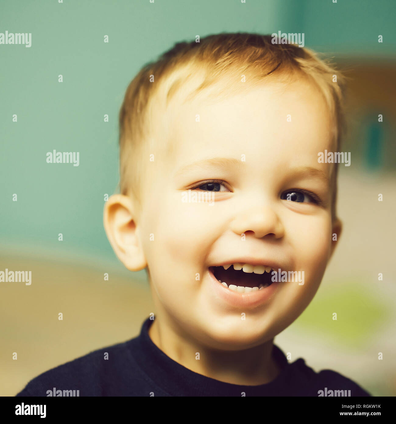 Small laughing boy child Stock Photo - Alamy