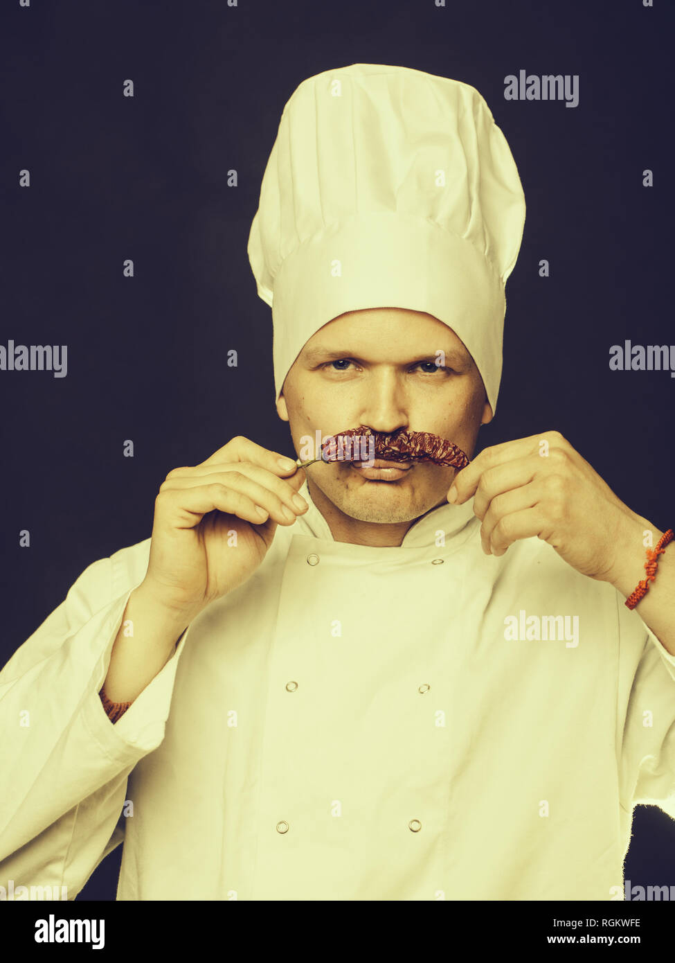 Chef with chili pepper Stock Photo - Alamy