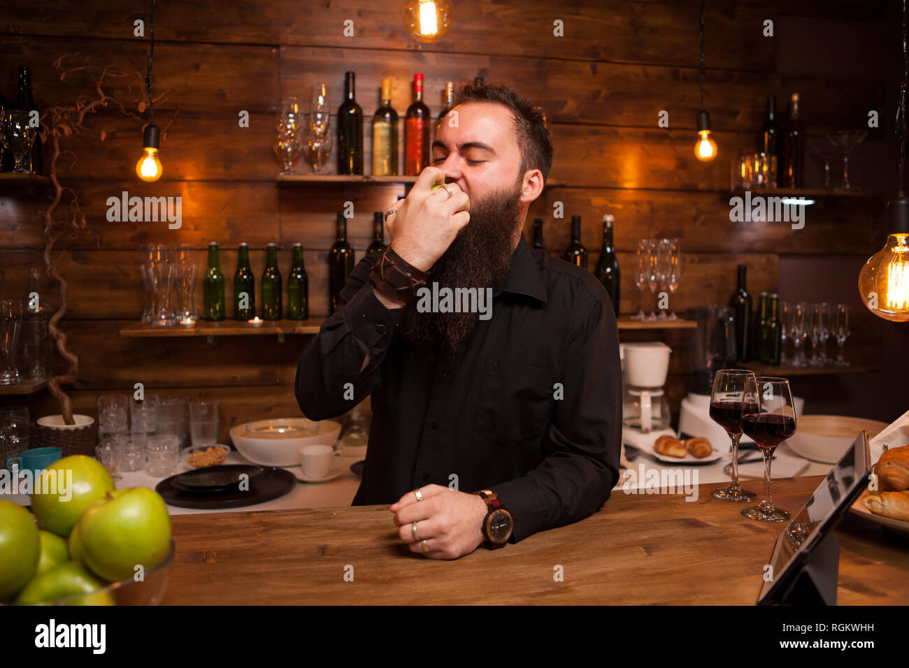 Man behind bar counter hi-res stock photography and images - Alamy