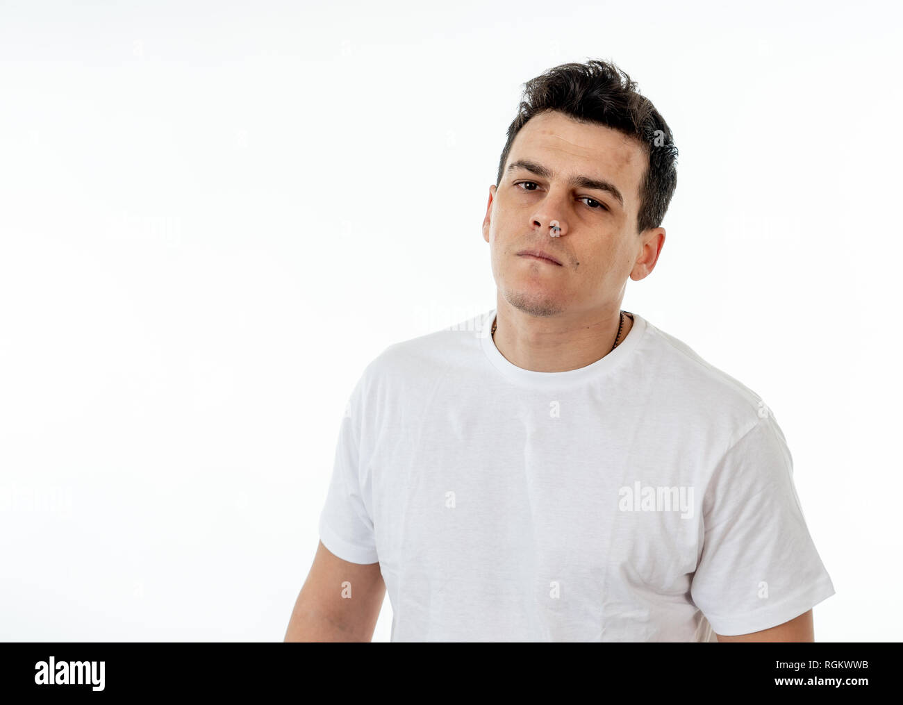 Close up portrait of an attractive young caucasian man with angry face ...