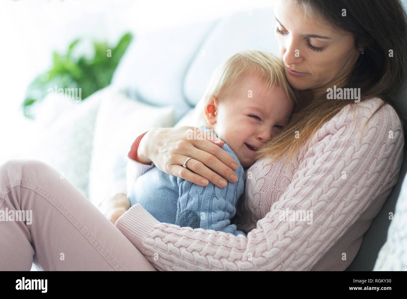 Child angry hugging hi-res stock photography and images - Alamy