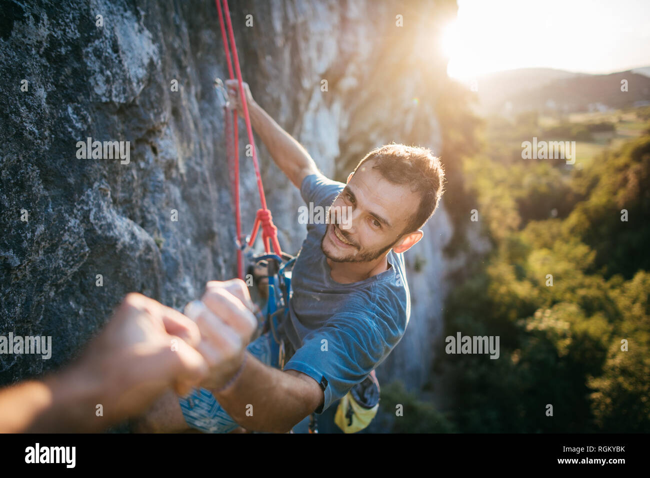 Climbing boy at sunset hi-res stock photography and images - Alamy