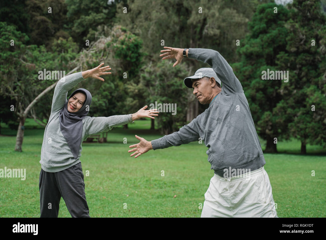 asian muslim senior couple exercising together Stock Photo - Alamy