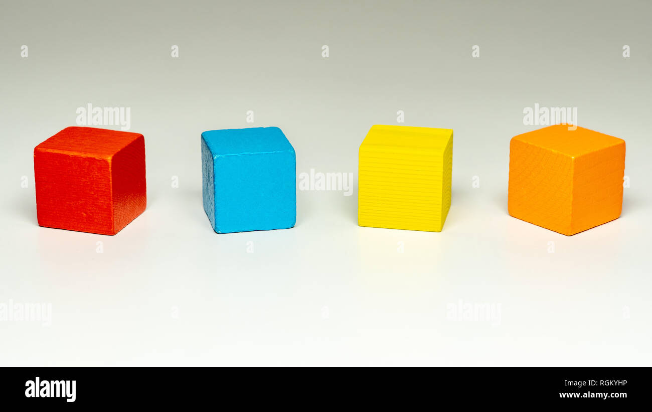 Toy blocks, multicolor wooden game cube with light background Stock ...