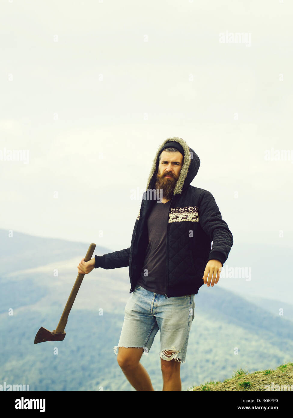 Strong man lumberjack with axe Stock Photo - Alamy