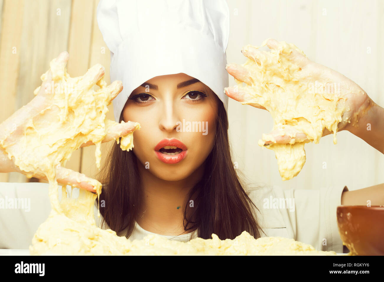 Woman cook with dough Stock Photo - Alamy
