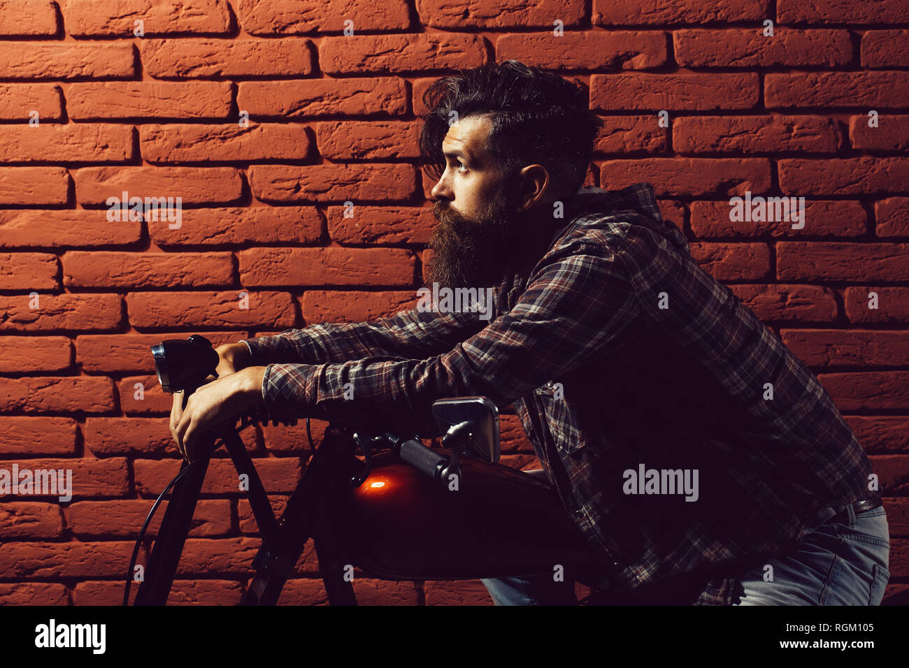 bearded biker man on motorbike Stock Photo - Alamy