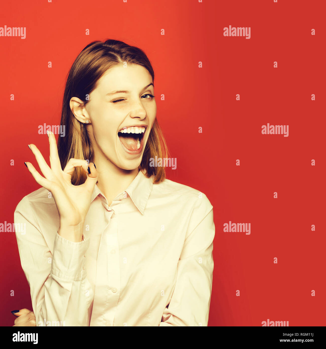 Winking girl hi-res stock photography and images - Alamy