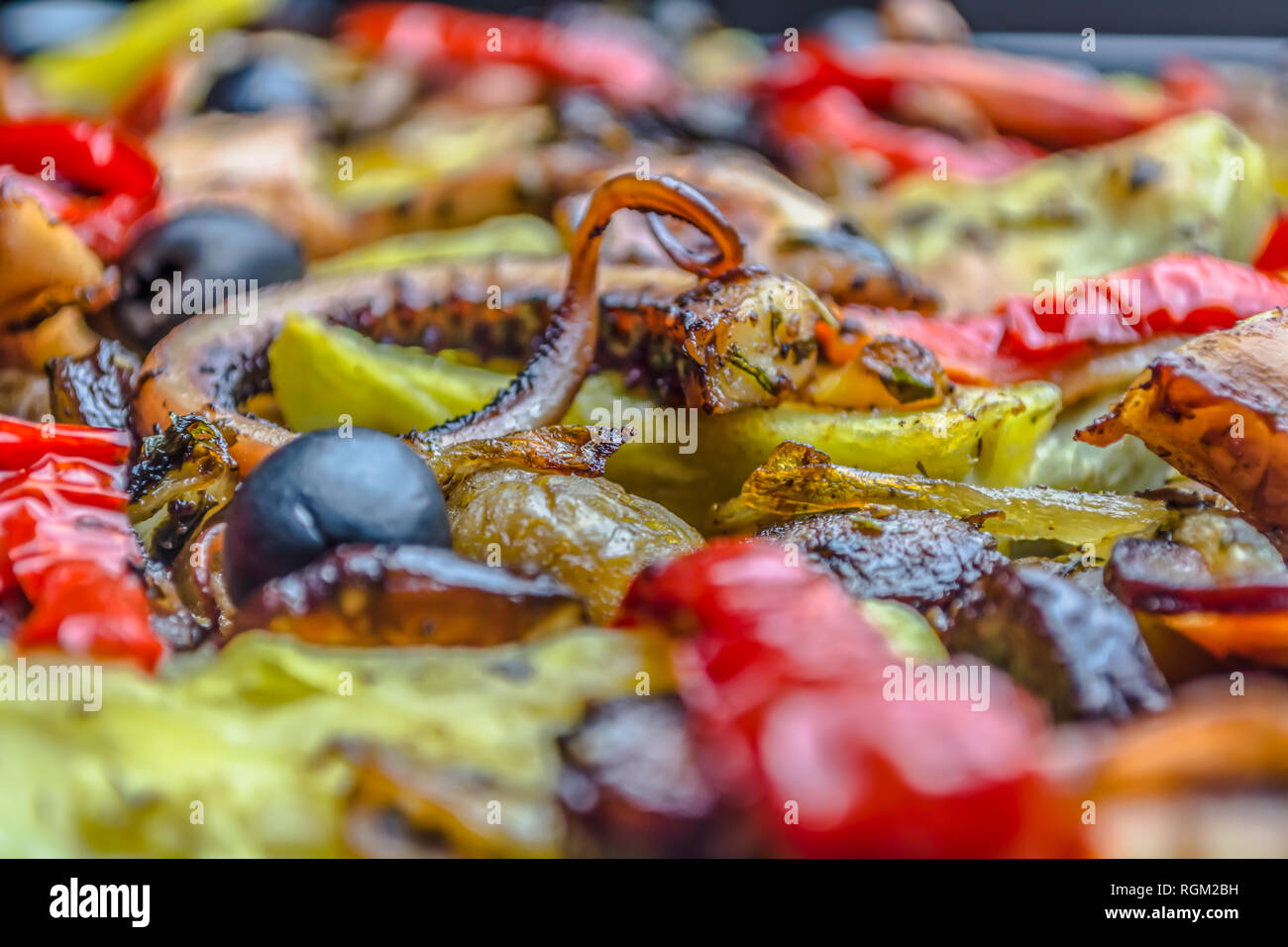 Food Theme: Roast octopus with sweet potatoes, red peppers and black ...