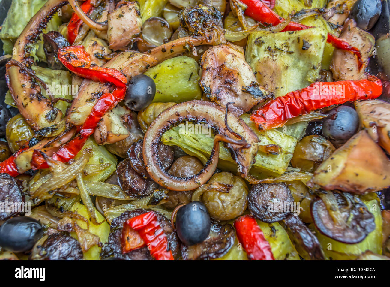 Food Theme: Roast octopus with sweet potatoes, red peppers and black ...