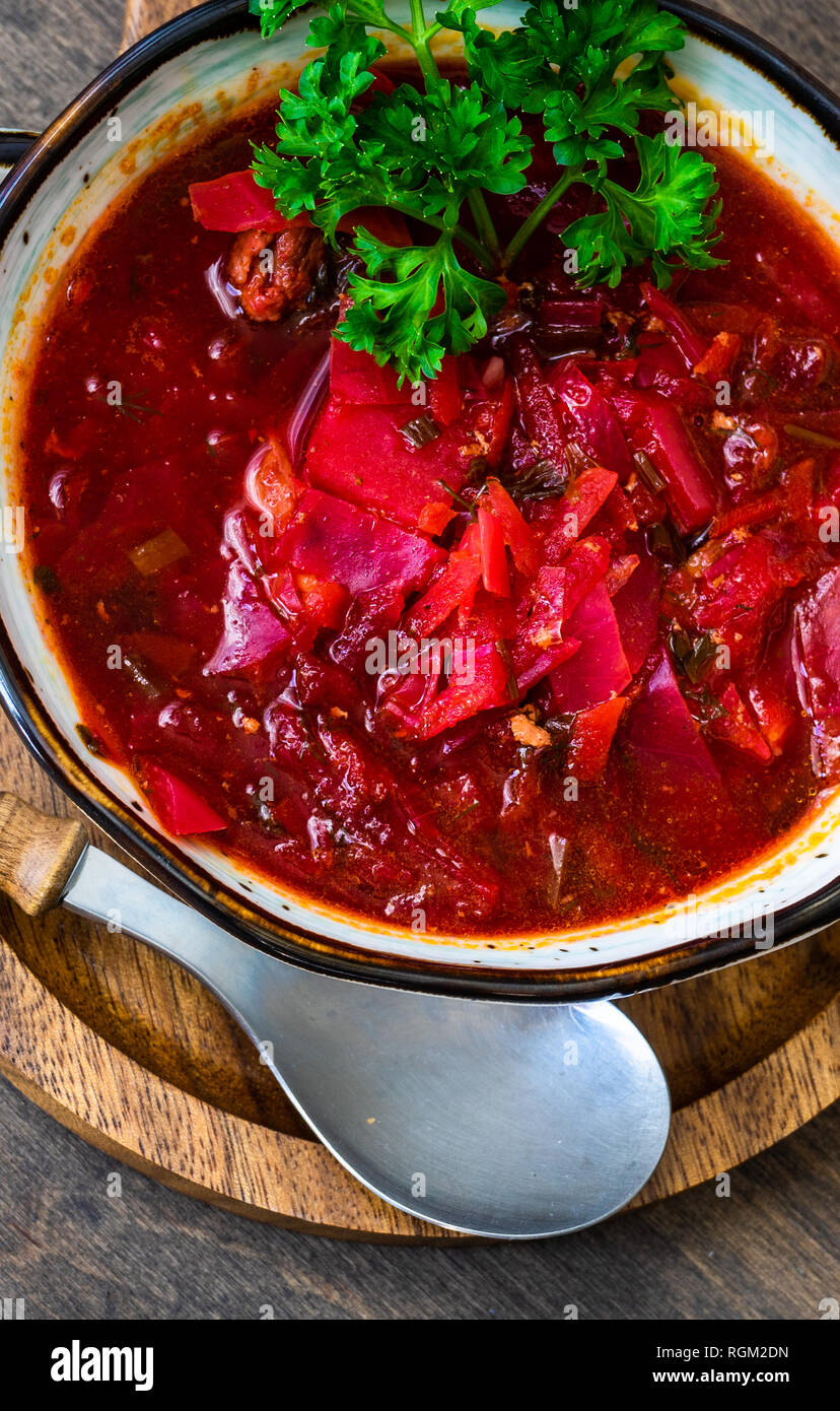Traditional ukrainian beet soup red borscht on wooden table Stock Photo ...