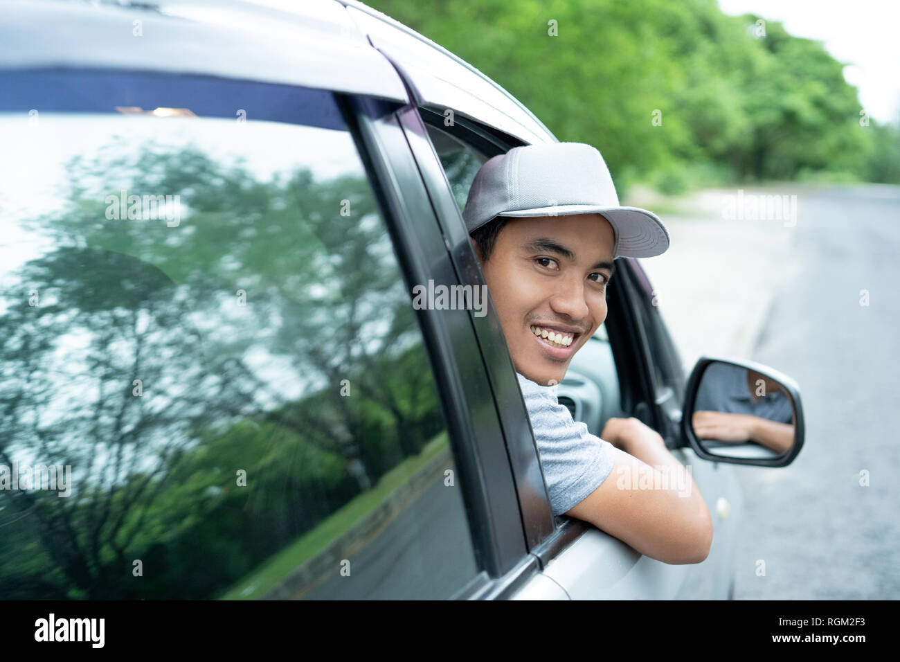 Man driving car windows hi-res stock photography and images - Alamy