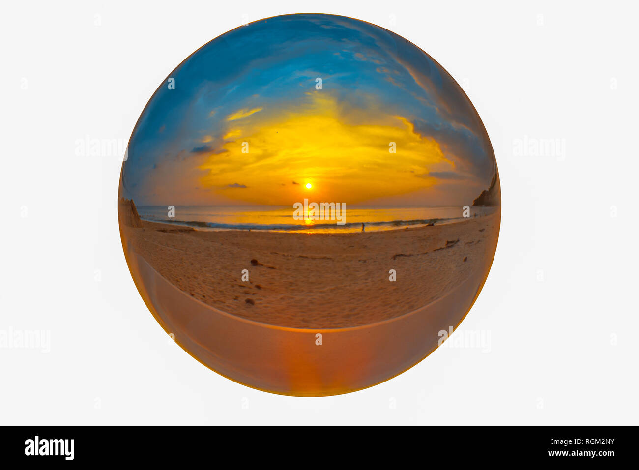crystal glass ball sphere reveals sunrise seascape with spherical ...