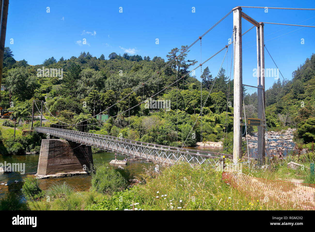 A suspension bridge over the Karangahake Gorge between Waikino and ...