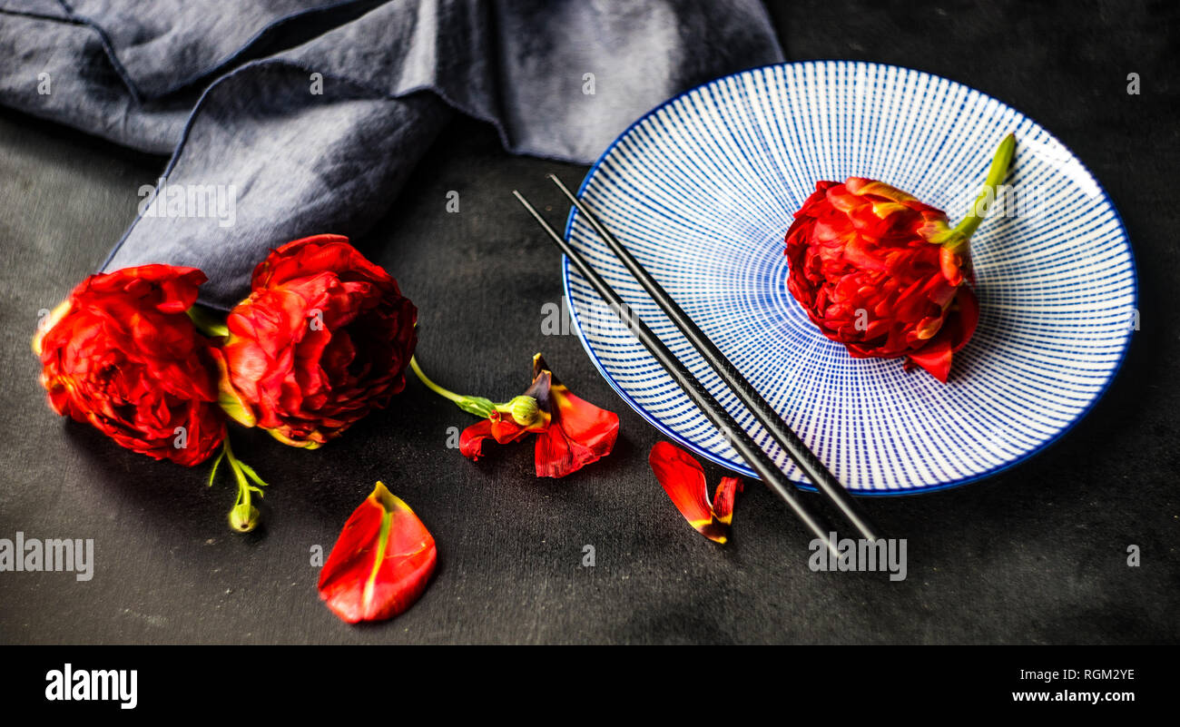 Summer table setting decorated with Red Princess tulips on rustic ...