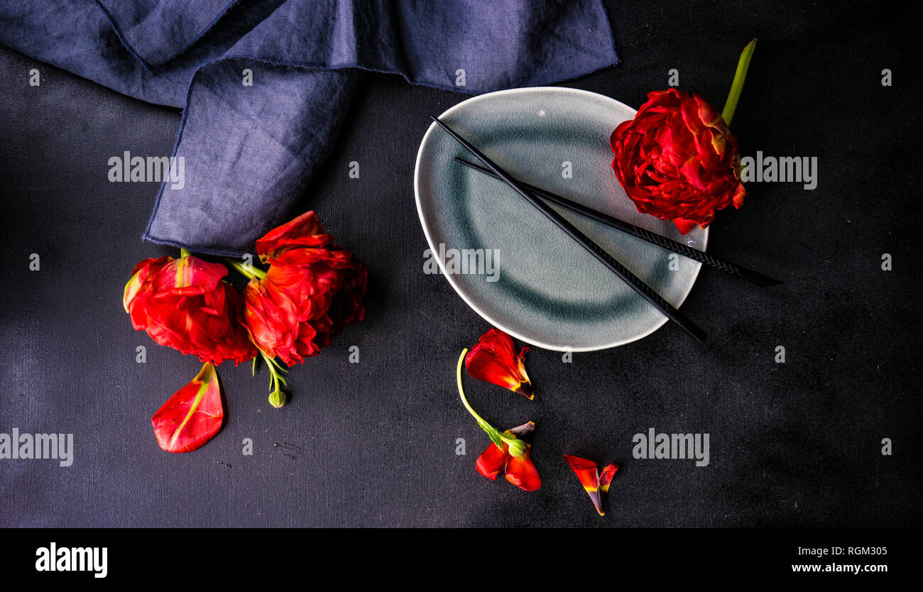 Summer table setting decorated with Red Princess tulips on rustic ...