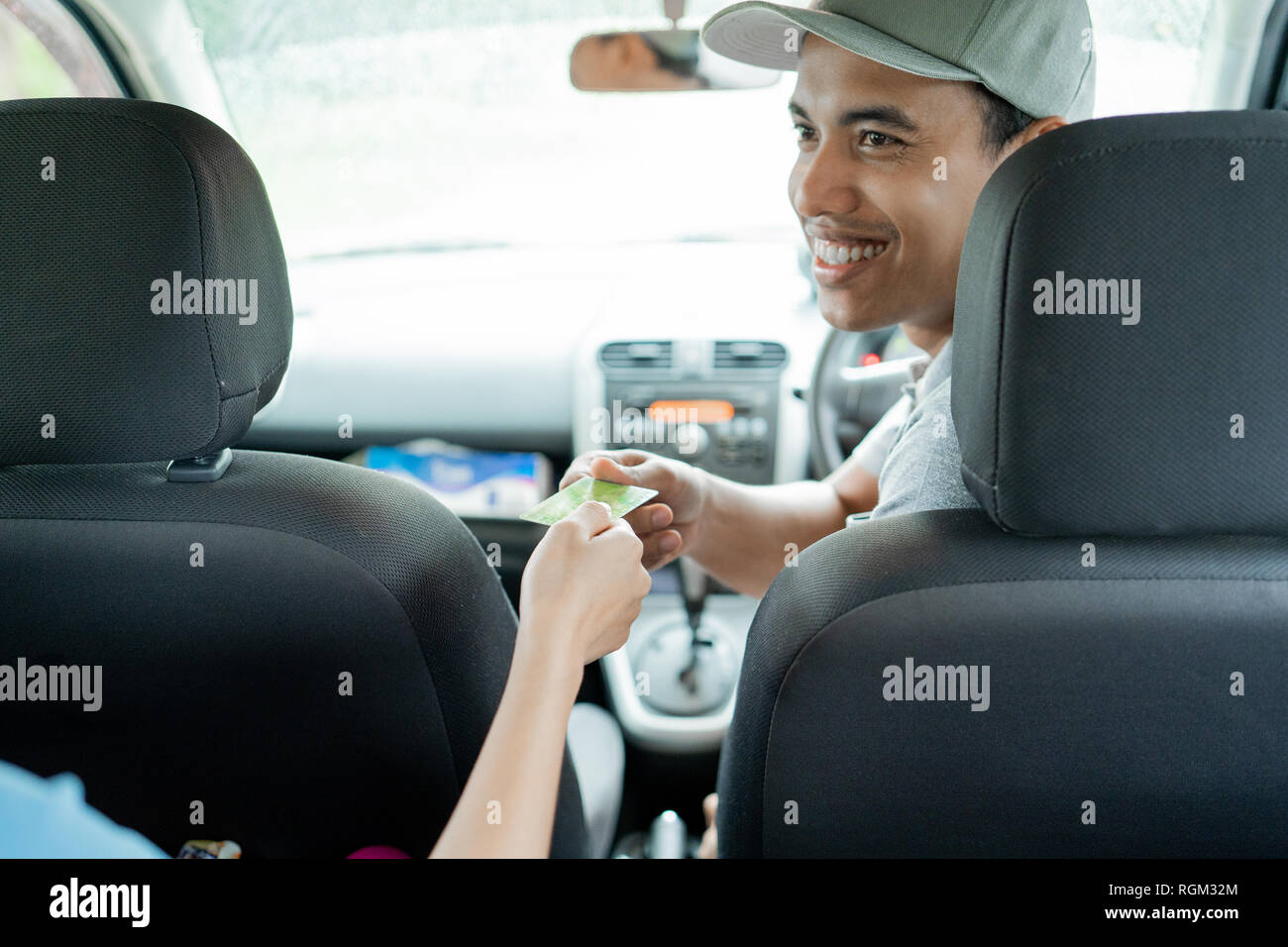 Driver using credit card hi-res stock photography and images - Alamy
