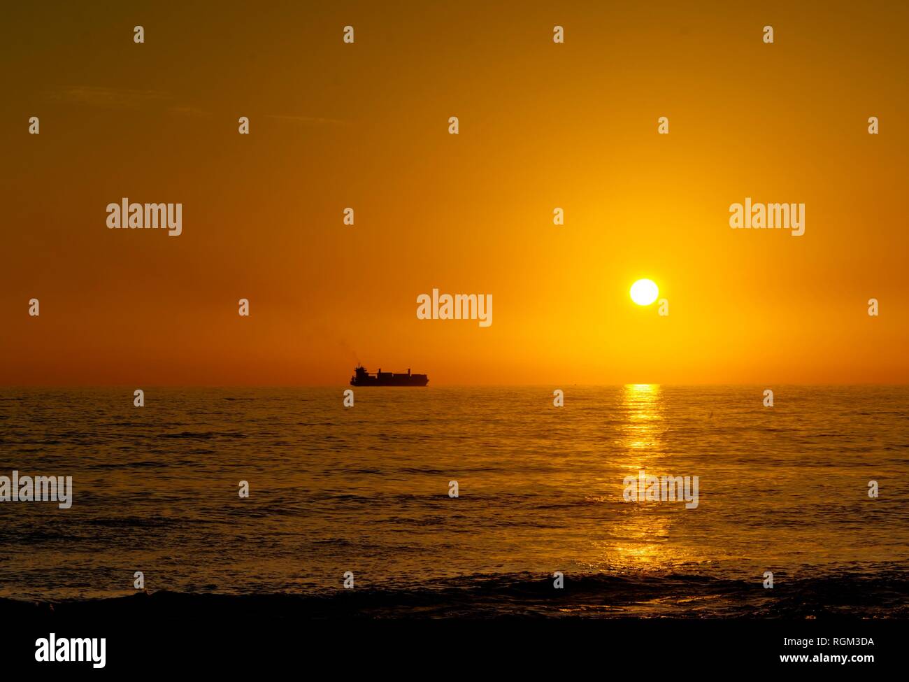 Container ship during sunset hi-res stock photography and images - Alamy