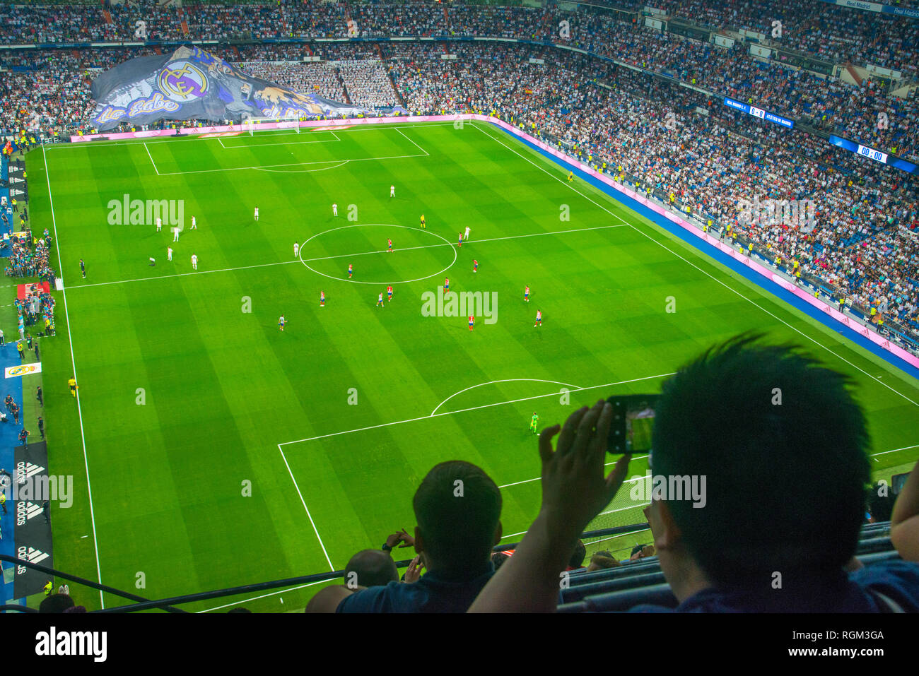 Spectators during football match. Santiago Bernabeu stadium, Madrid ...