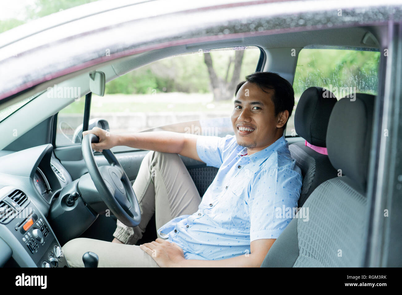 a man enjoying for time break inside a car Stock Photo - Alamy