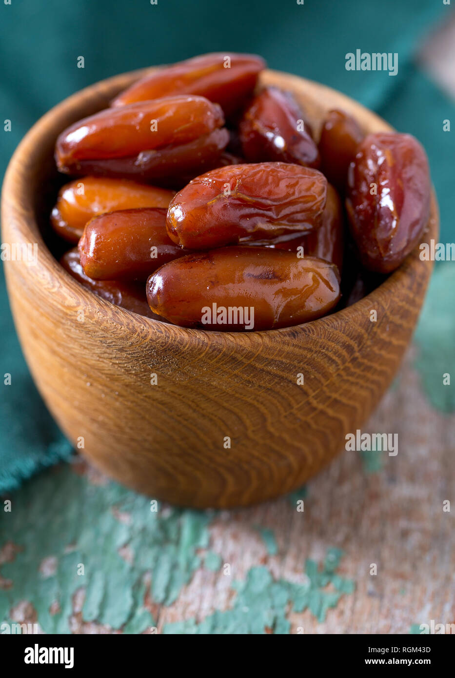 dried dates on a beautiful wooden background Stock Photo - Alamy