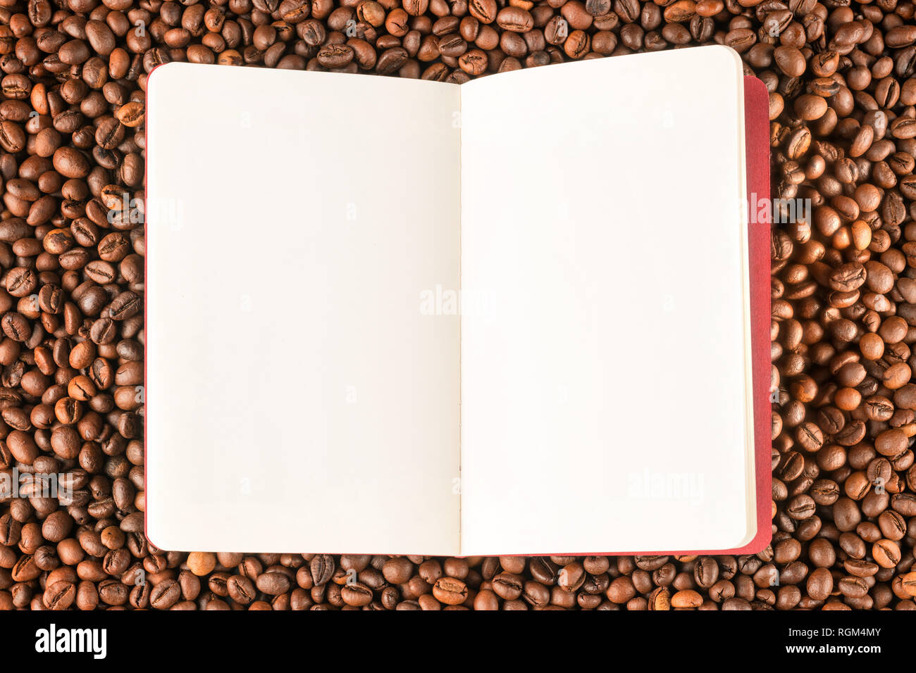 Open note on coffee beans background. Template with copy space Stock ...