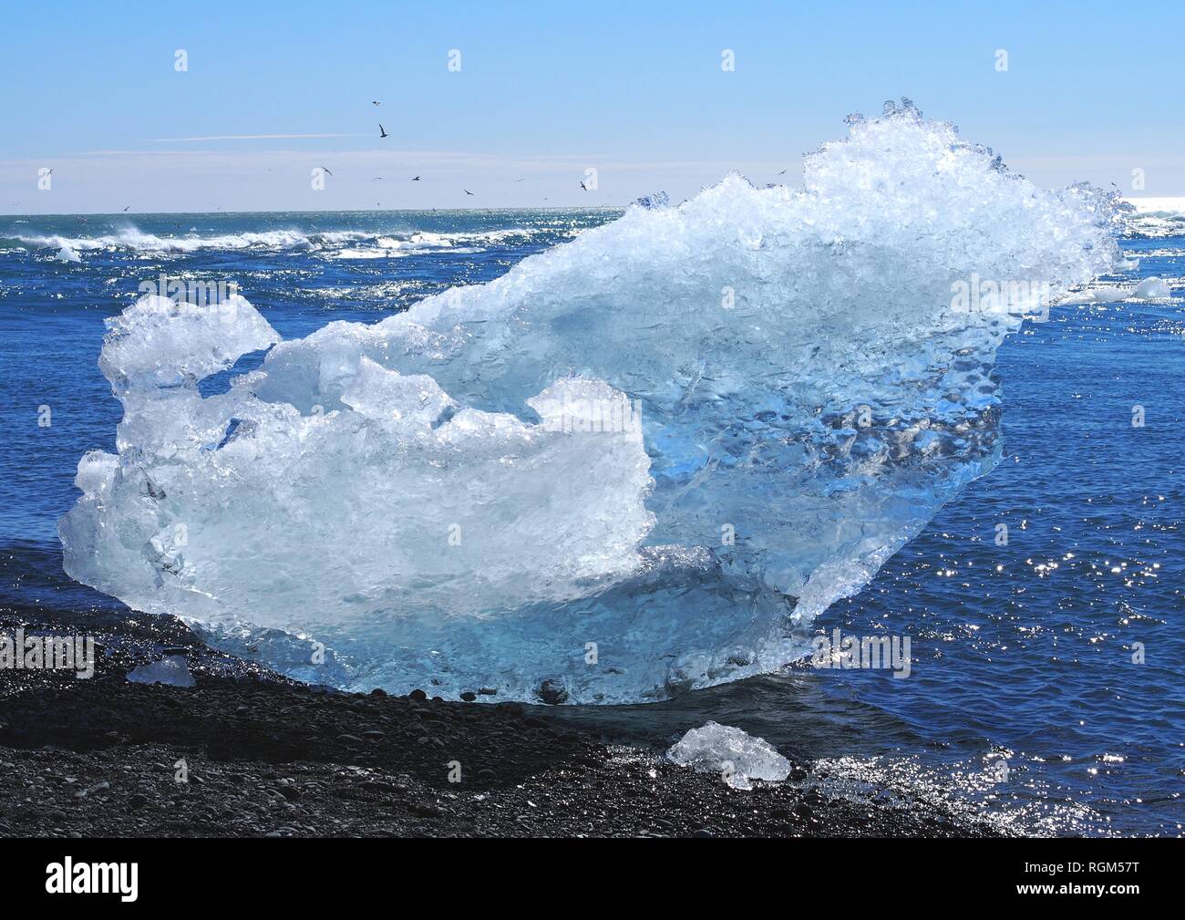 Impressive iceberg on beach of Joekulsarlon (Iceland) in the sun Stock ...