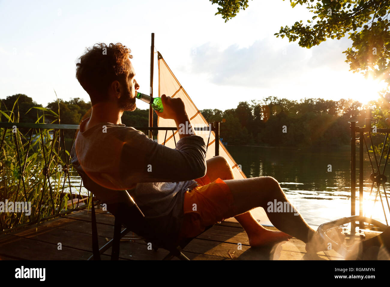 Man boat drink hi-res stock photography and images - Alamy