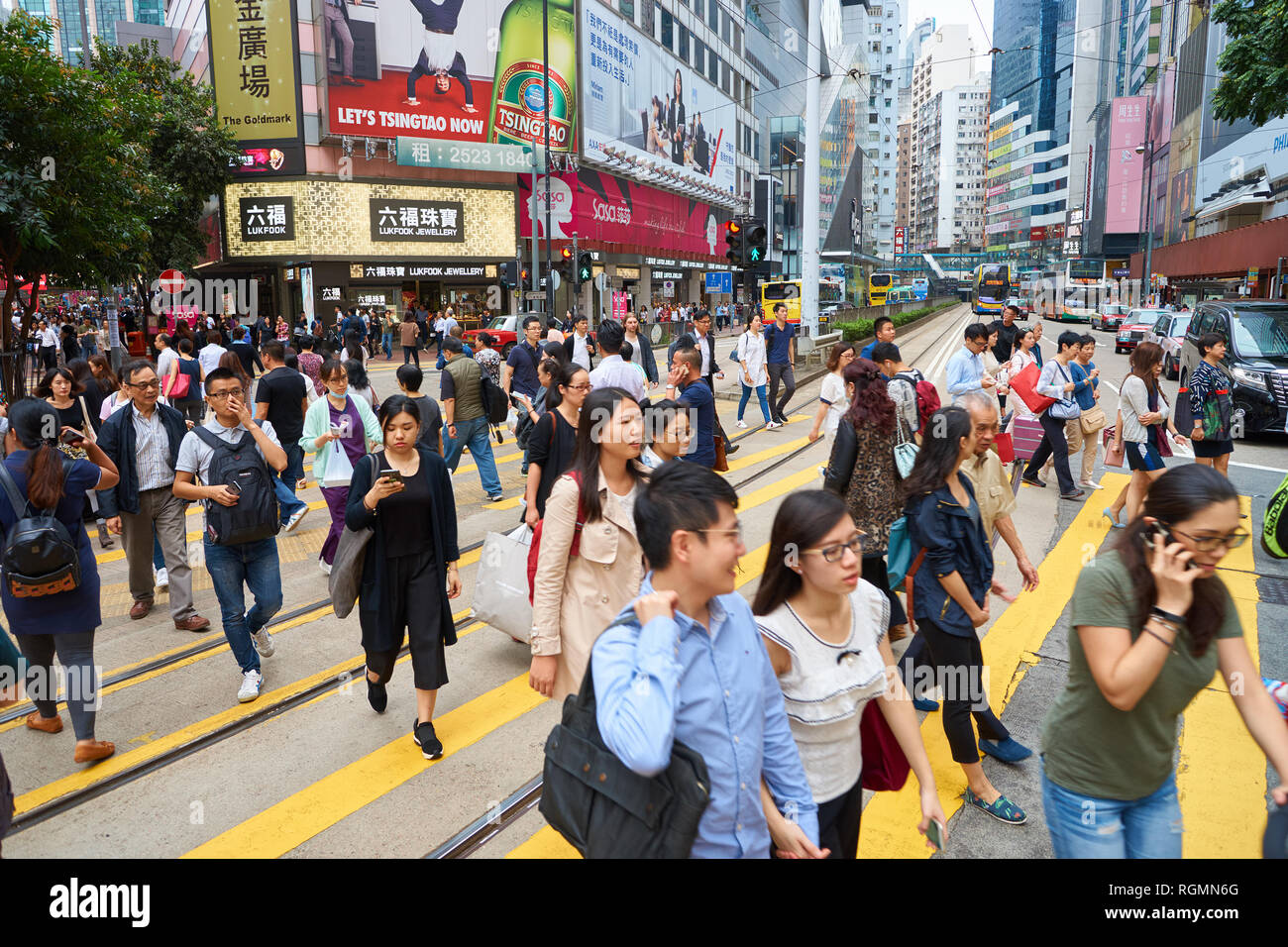 HONG KONG - CIRCA NOVEMBER, 2016: crowd of people walking crossing road ...