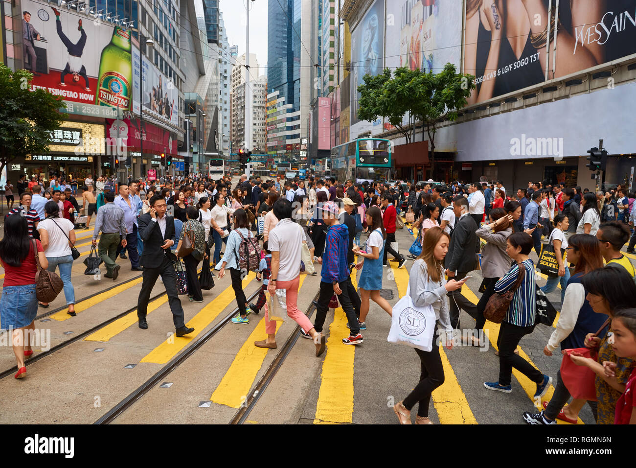 HONG KONG - CIRCA NOVEMBER, 2016: crowd of people walking crossing road ...