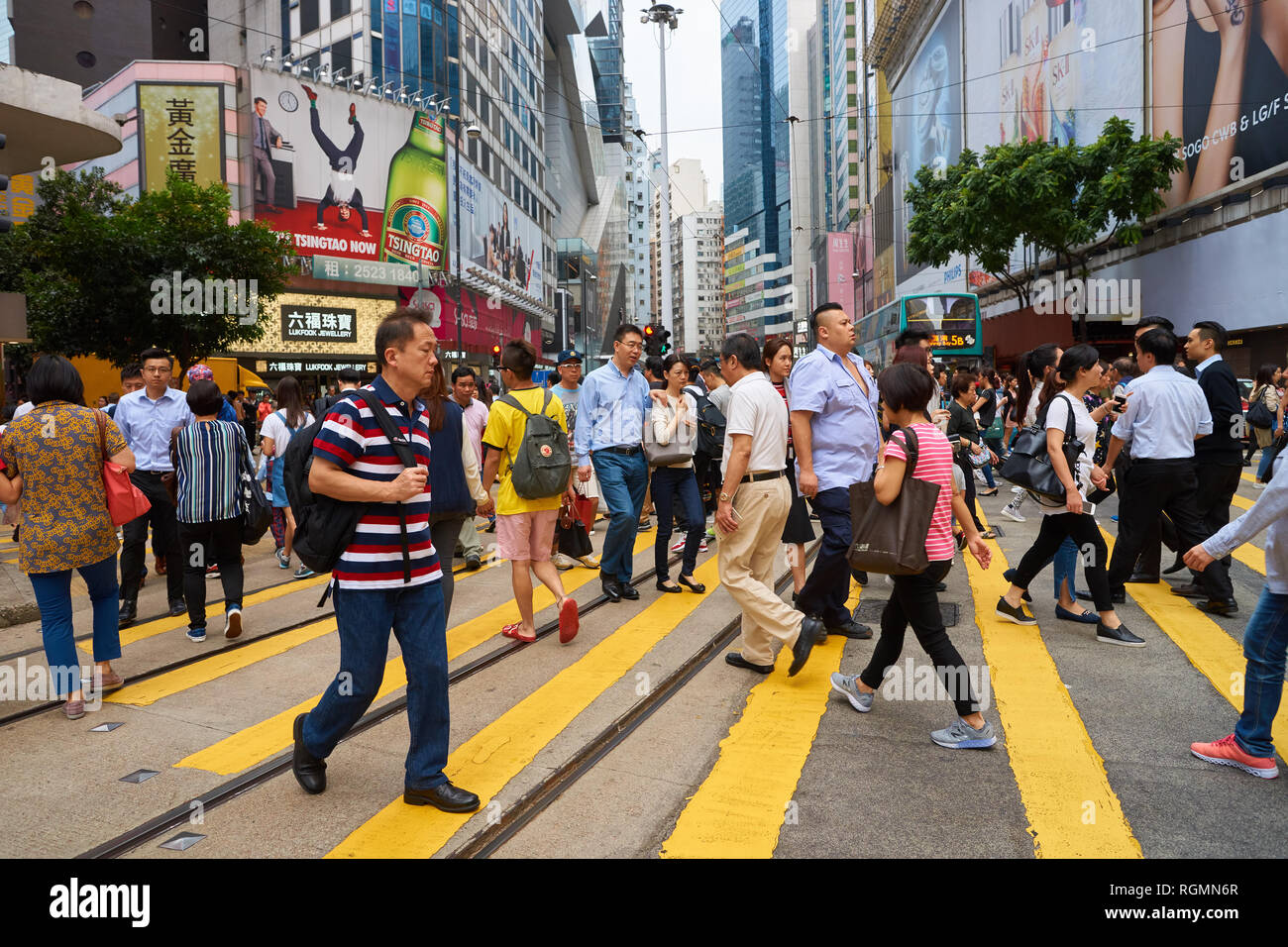 HONG KONG - CIRCA NOVEMBER, 2016: crowd of people walking crossing road ...