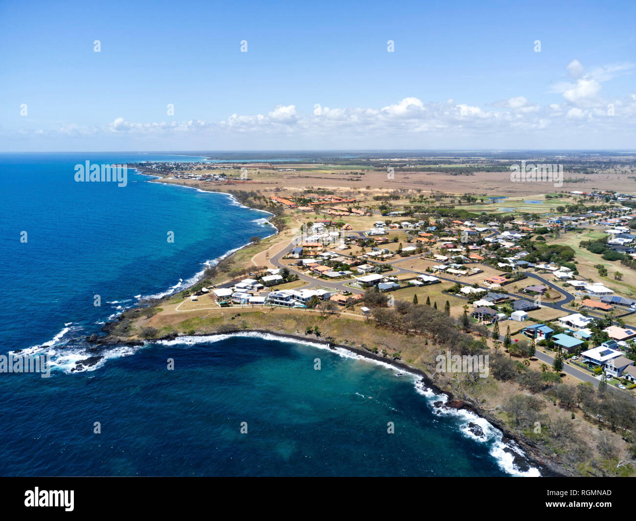 Aerial of the coastal community of Innes Park on the Coral Coast near ...