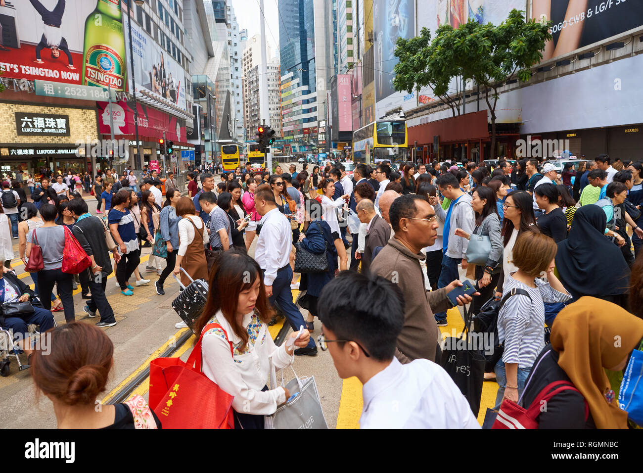 HONG KONG - CIRCA NOVEMBER, 2016: crowd of people walking crossing road ...