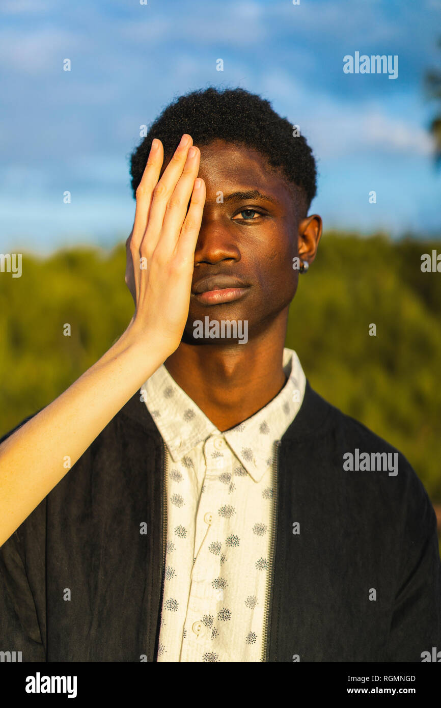 Man covering eyes of woman with his hand surprise hi-res stock ...